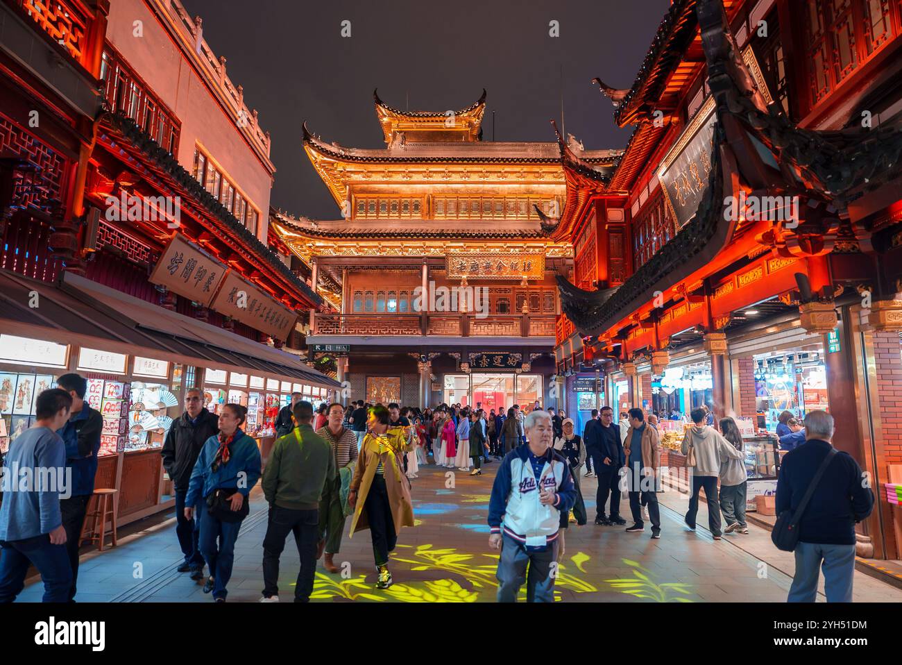 Vibrant Night Scene in Shanghai's Old Town with Illuminated Rooftops ...