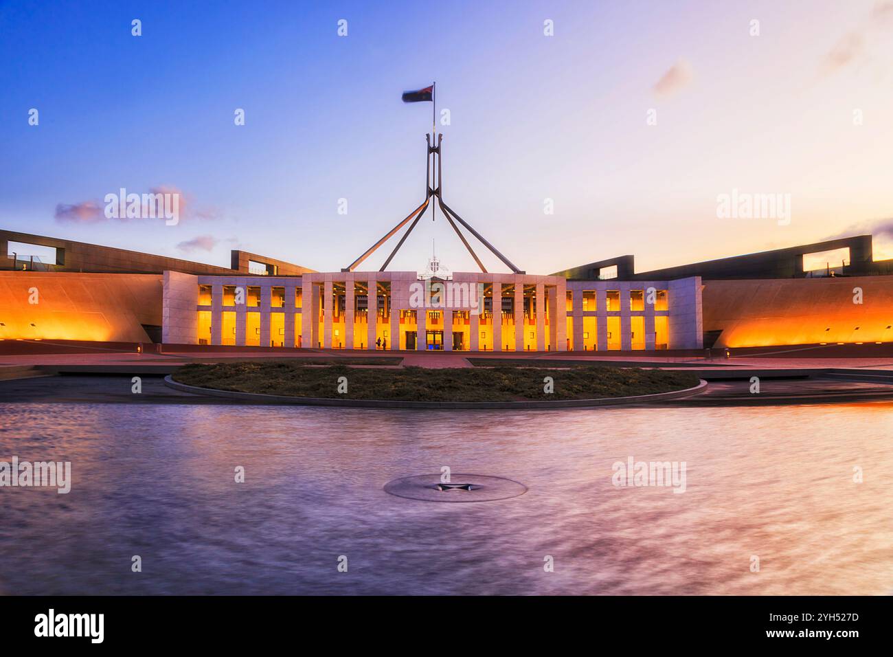 Modern city architecture of facade of the Federal Parliament house public service in Canberra ...