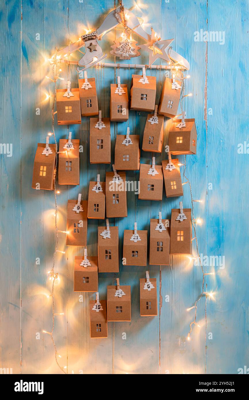 Cute Christmas Advent Calendar as a countdown to Christmas Eve on blue ...