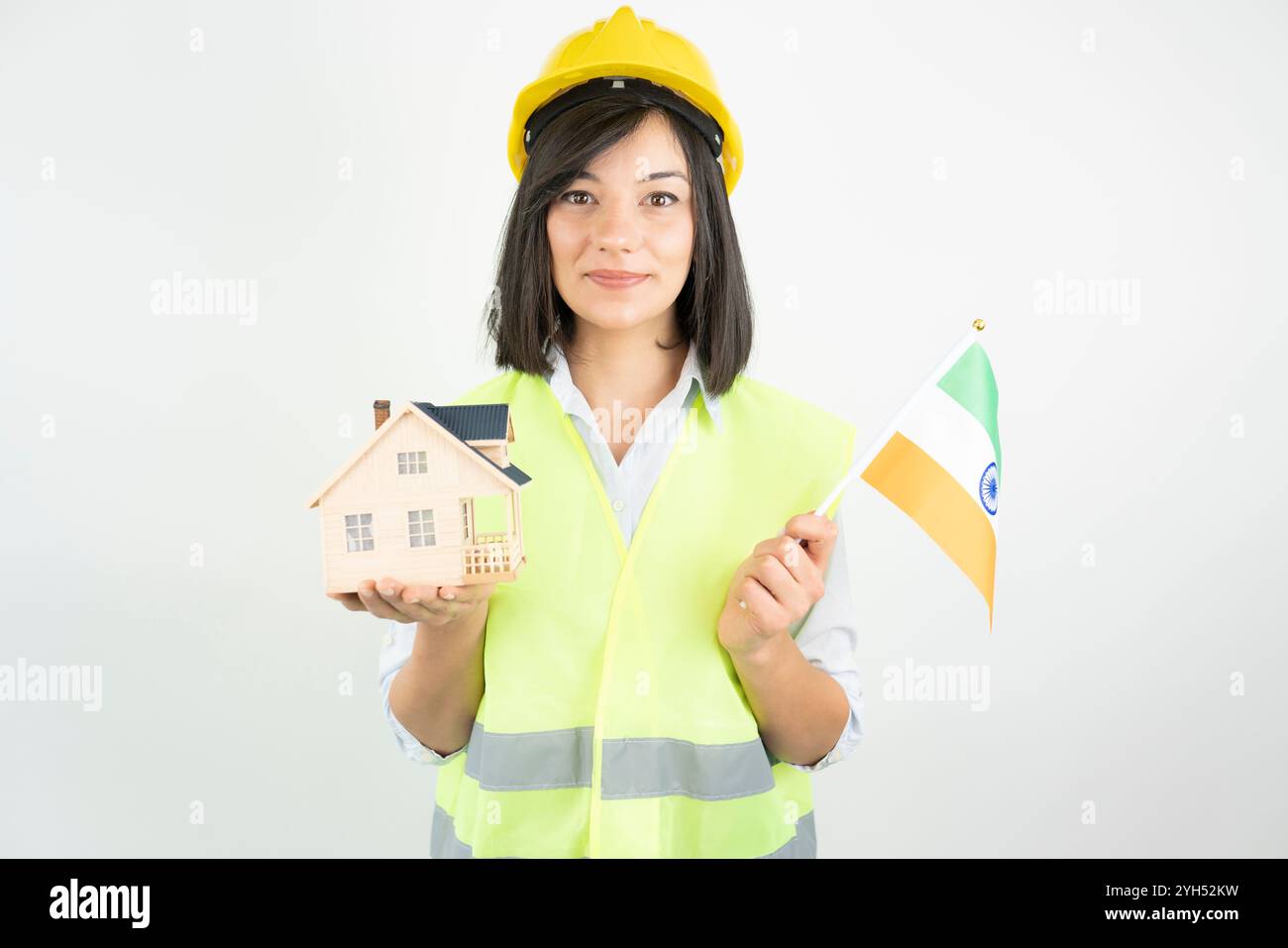 Home inspector woman or engineer holding indian flag and detached house ...