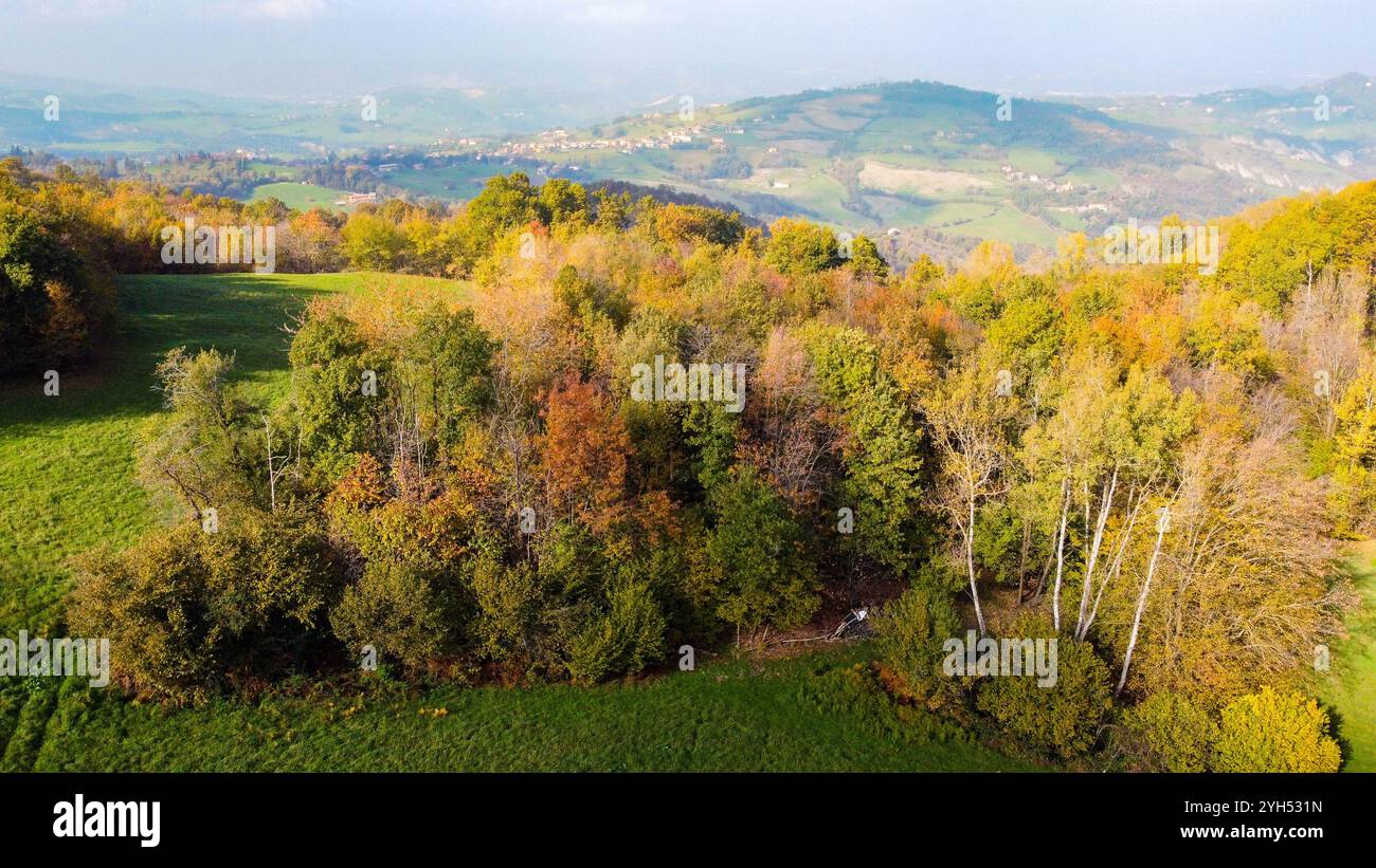 Aerial landscape of Appennini colorfull hills and woods during a sunny ...