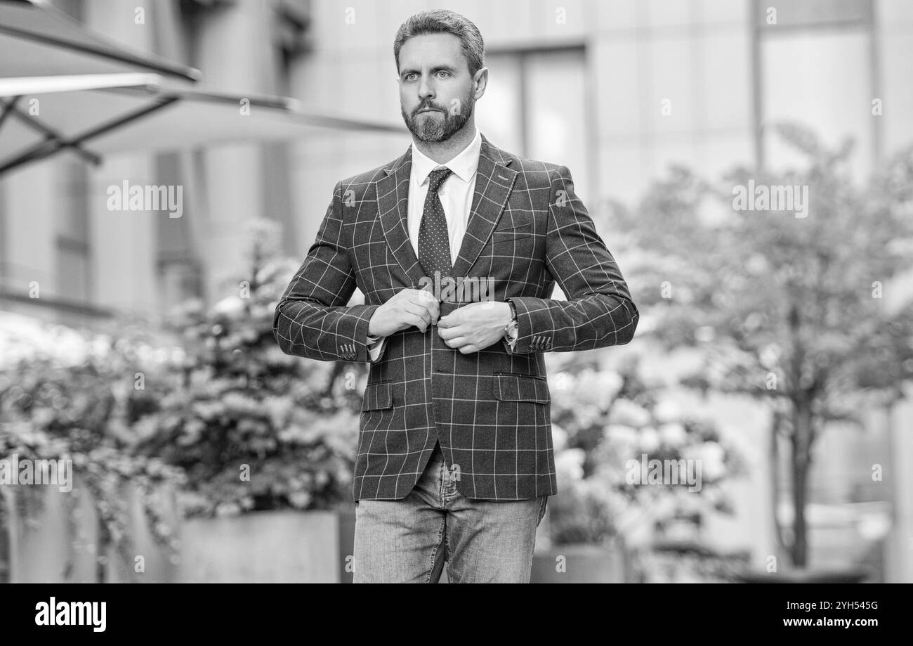 business boss standing outdoor. business boss on urban background ...
