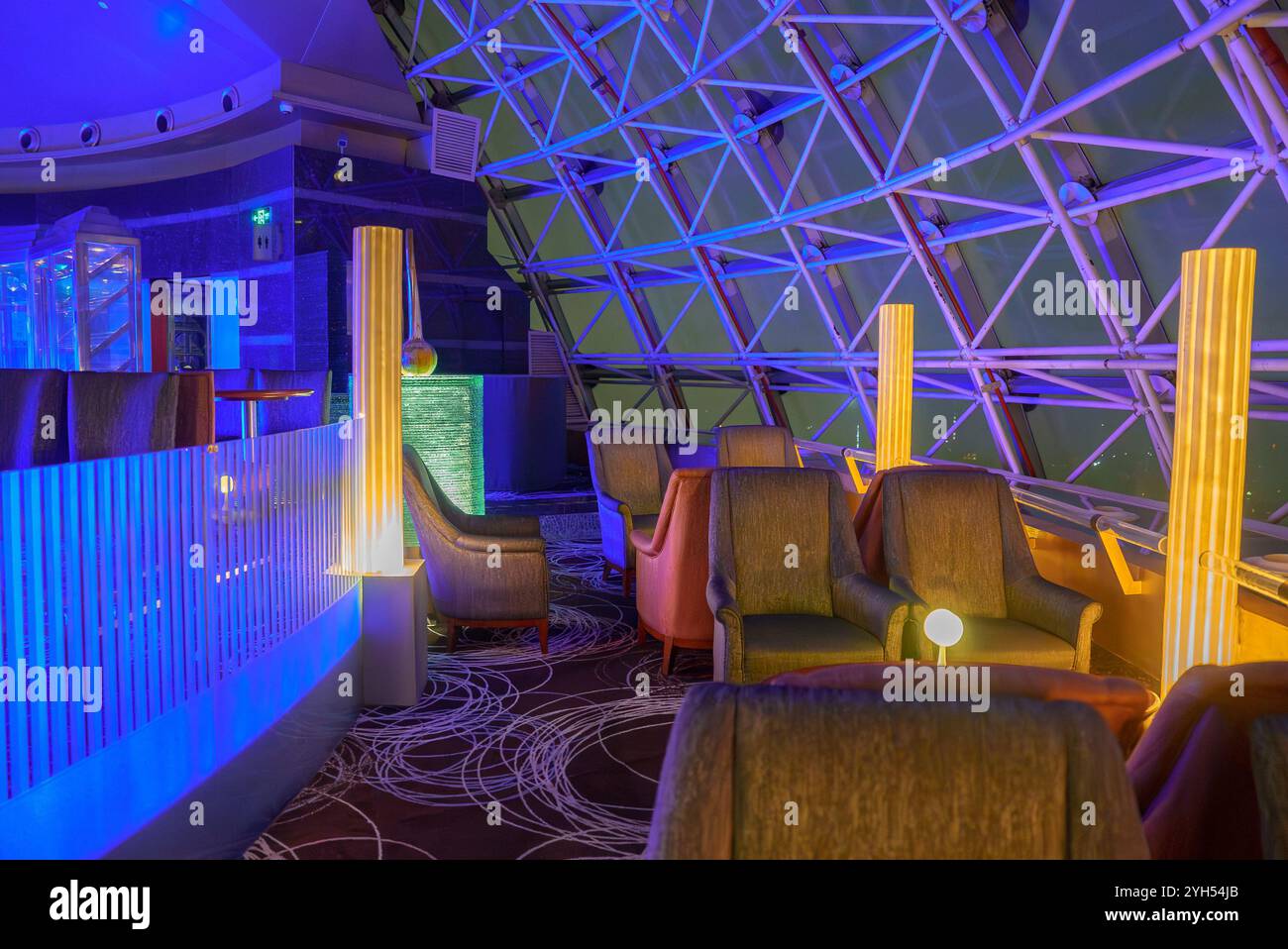 Modern lounge area features comfortable hi-res stock photography and ...