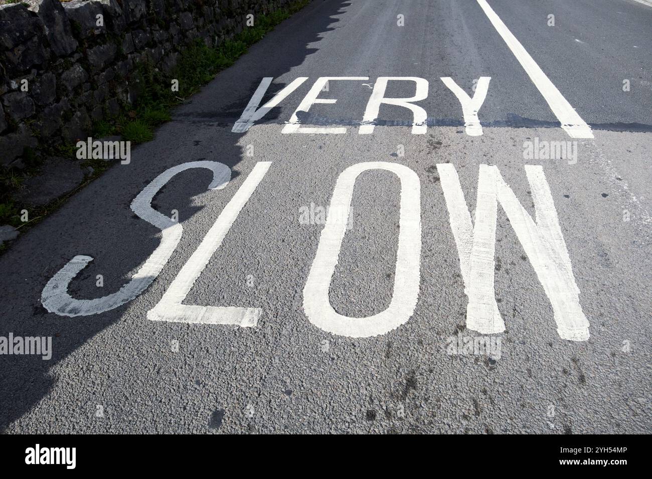 Slow painted road marking hi-res stock photography and images - Alamy