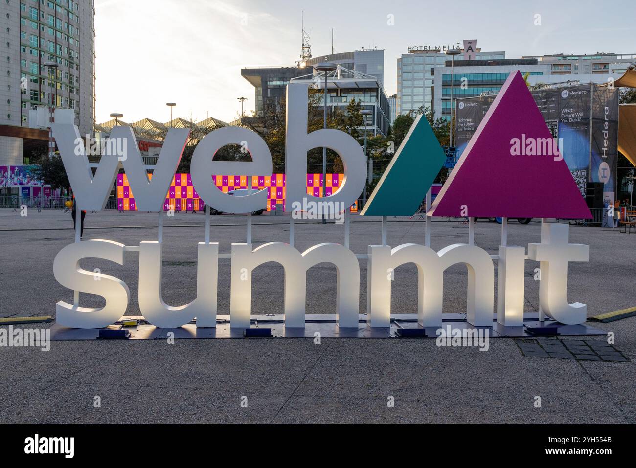 Large illuminated web summit sign displayed outdoors in lisbon ...
