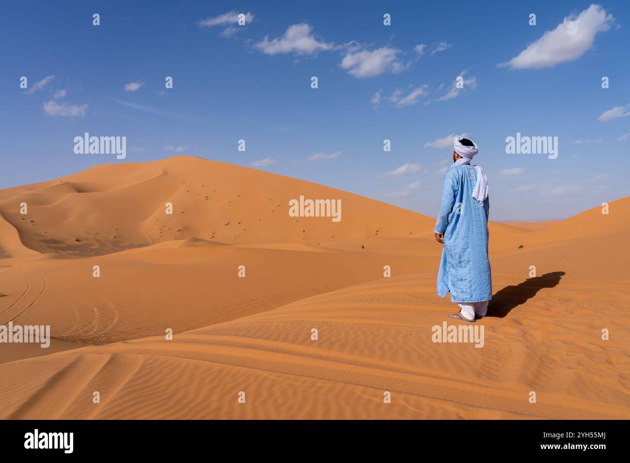 A local people standing and enjoying the view of the sand dune in the ...