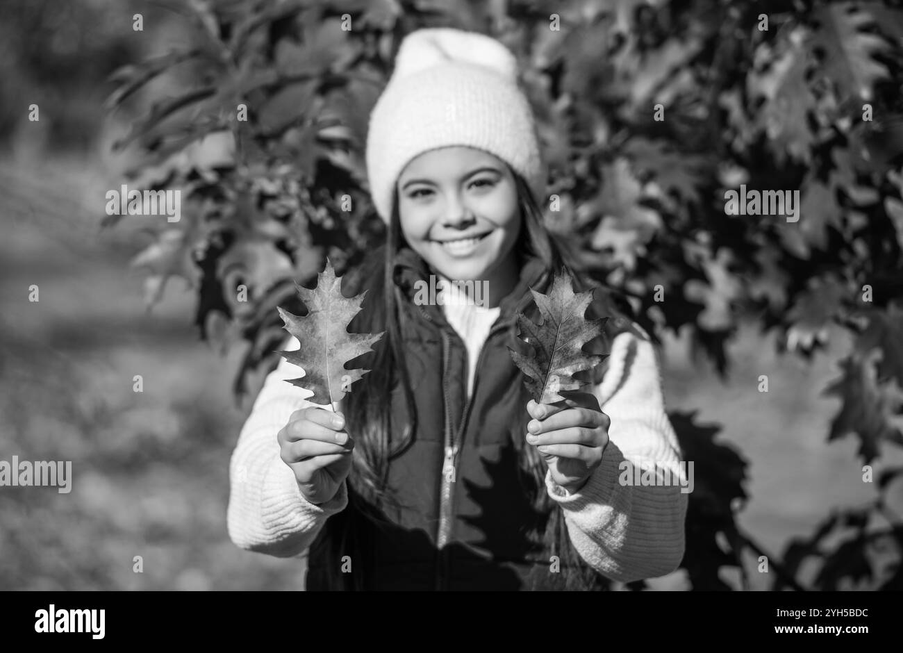 happy teen girl in fall. teenage girl at autumn oak leaves. teenage ...