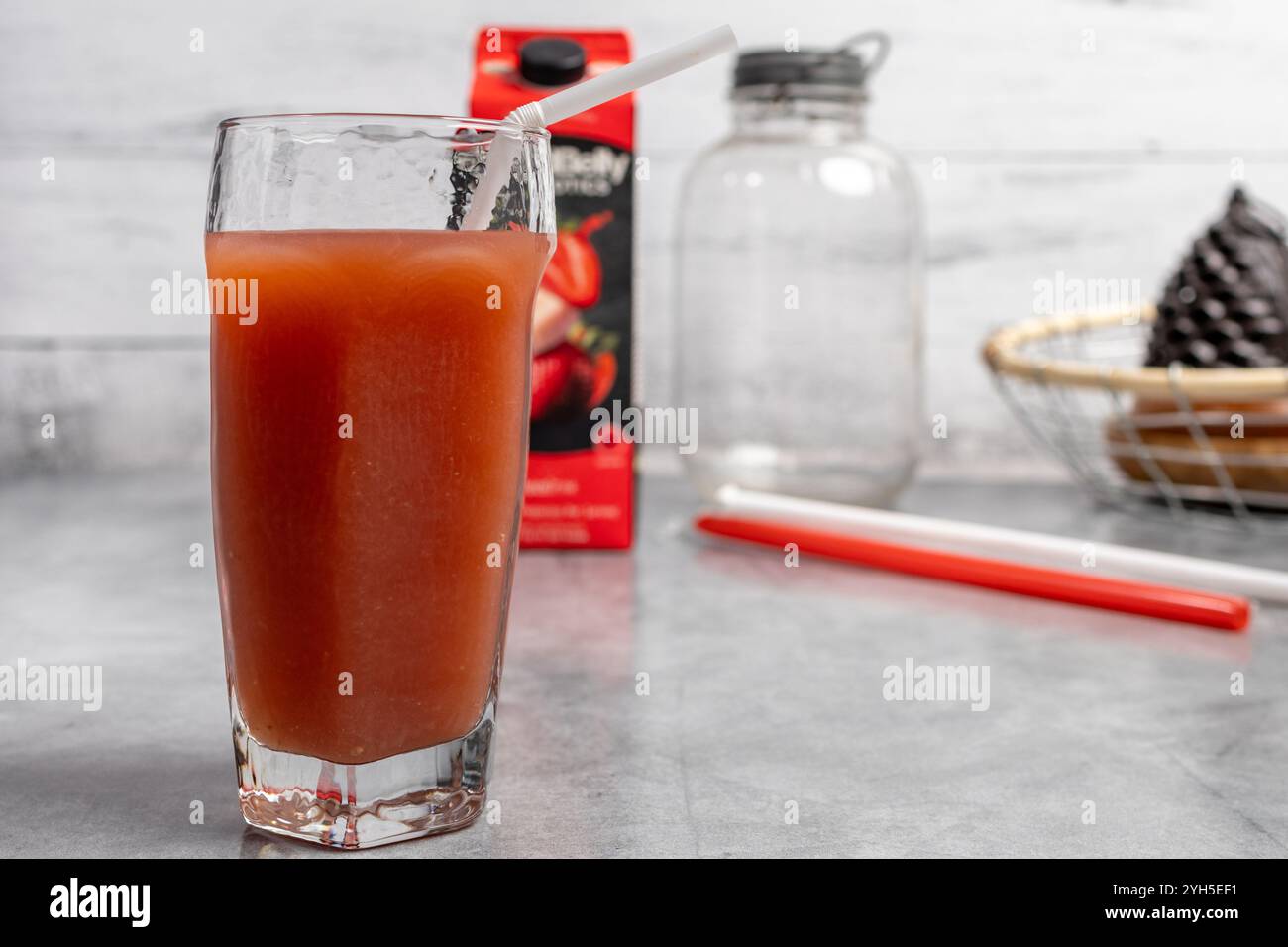 Strawberry Banana Probiotics Juiice in Glass with straw Stock Photo - Alamy