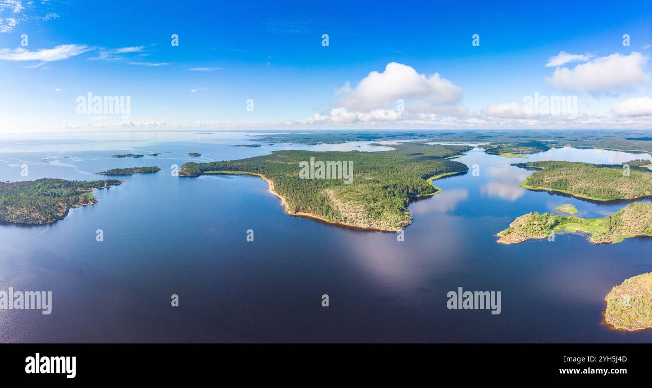 Aerial top view to island Kilpola overgrown with sparse trees in summer ...