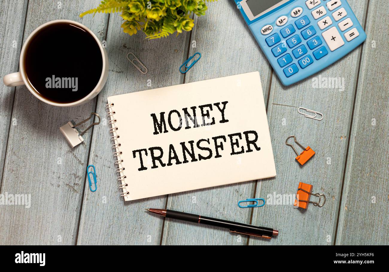 Hand writing the text: Money Transfer Stock Photo - Alamy