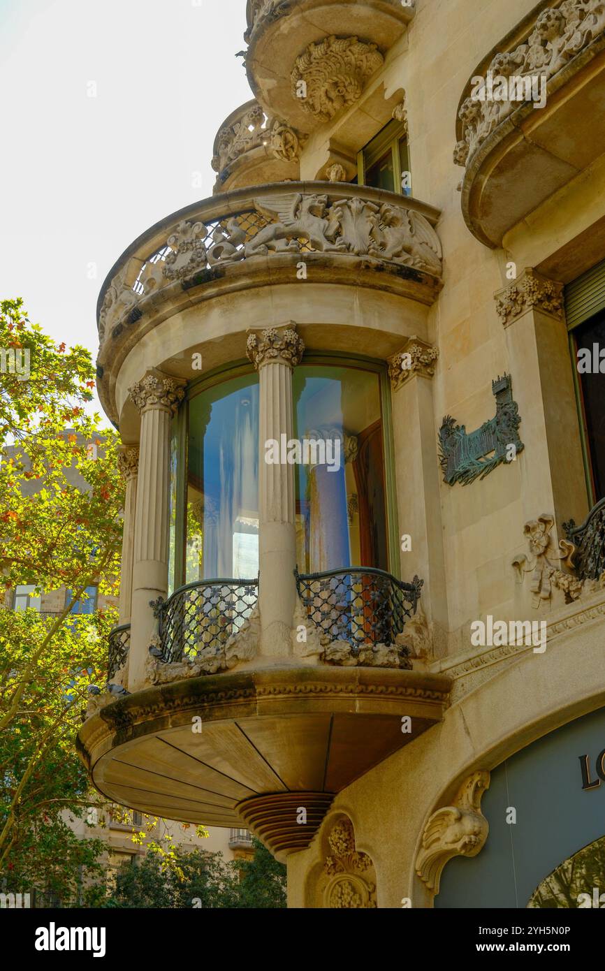 BARCELONA, SPAIN - October 3, 2024: Iconic Casa Batll shows Antoni Gaudis art nouveau style with ...