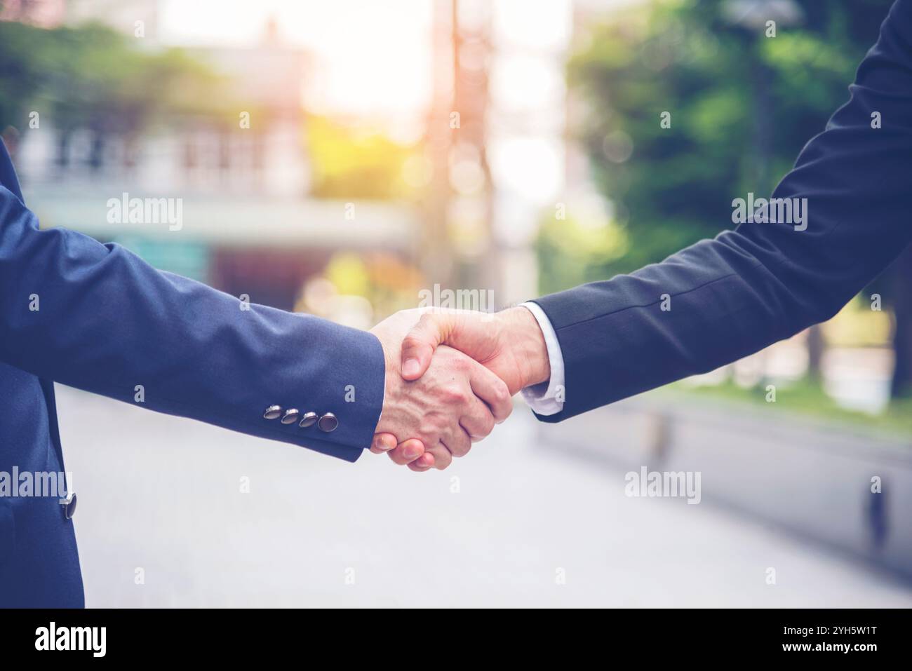 Team Business Partners shaking hands together to Greeting Start up new ...
