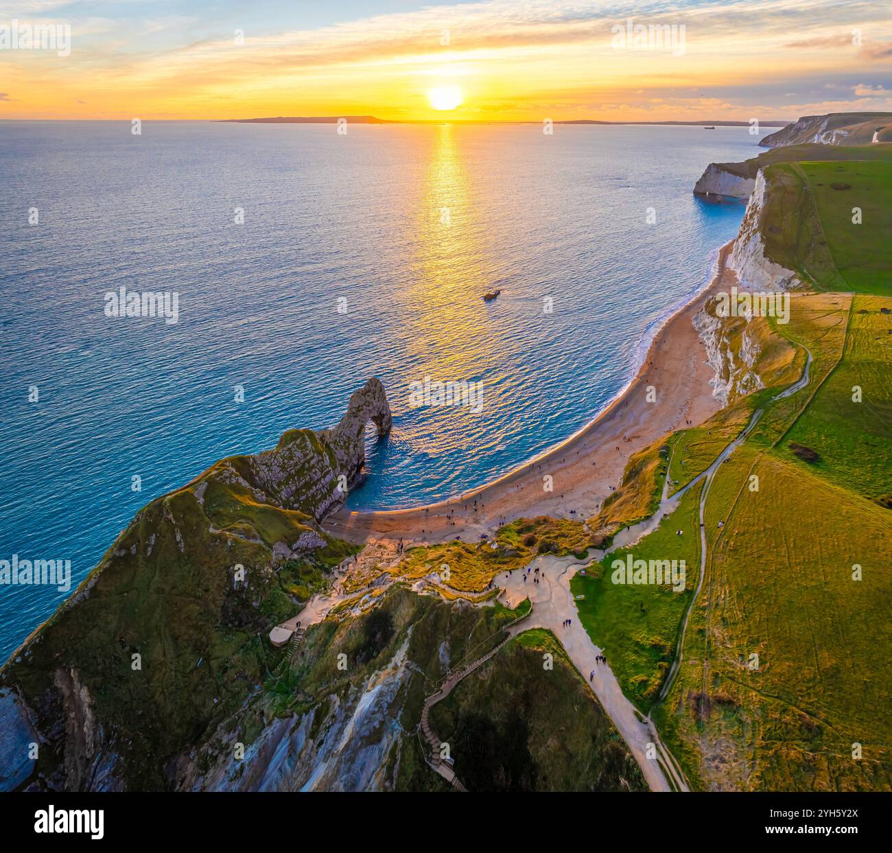 Aerial view of Durdle Door, a natural limestone arch on the Jurassic ...