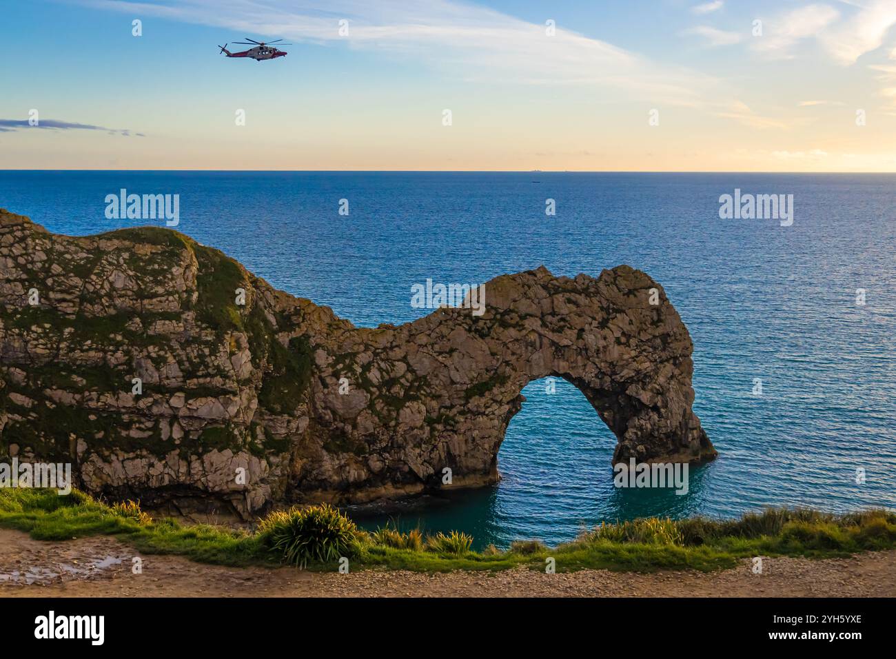 Aerial view of Durdle Door, a natural limestone arch on the Jurassic ...
