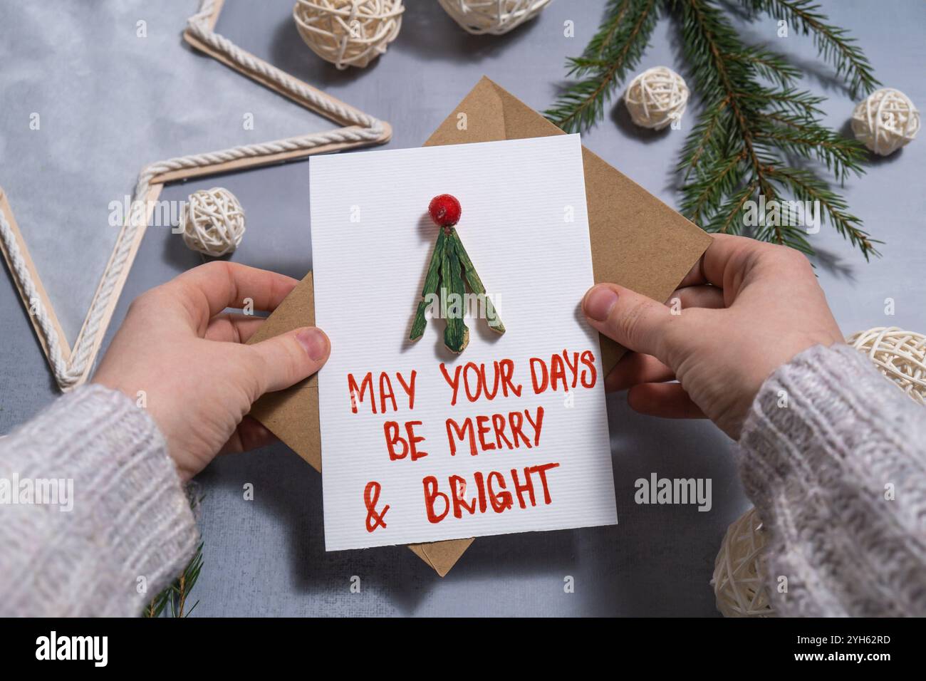 Christmas tree Sustainable Christmas preparation female hand holding ...