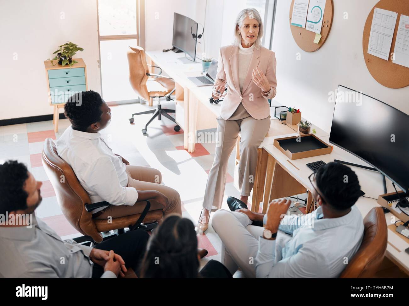 Business, mature CEO and training team in office on risk management ...