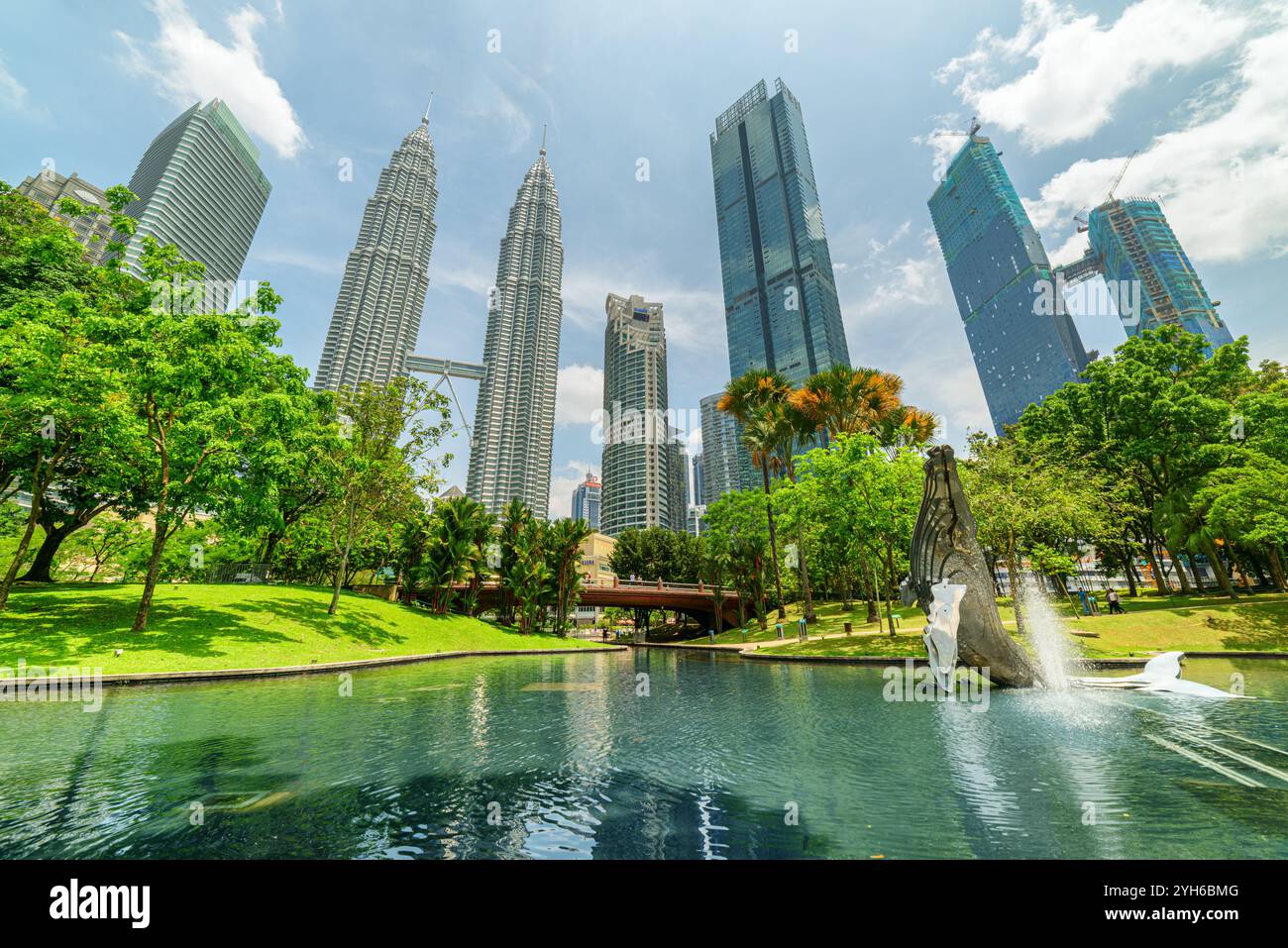 Scenic artificial lake at the KLCC Park and skyscrapers Stock Photo - Alamy
