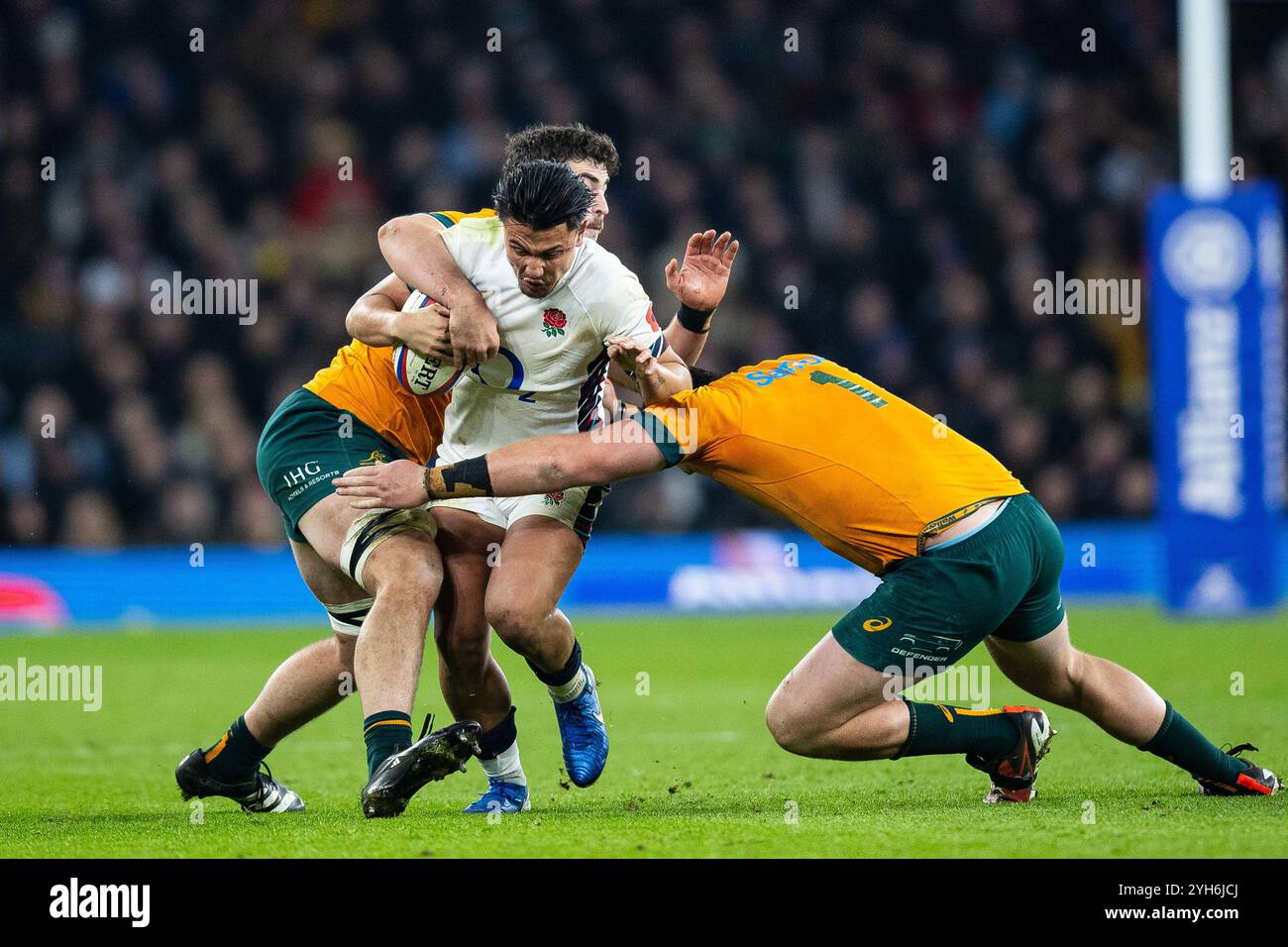 Marcus Smith of England under pressure from Angus Bell of Australia ...