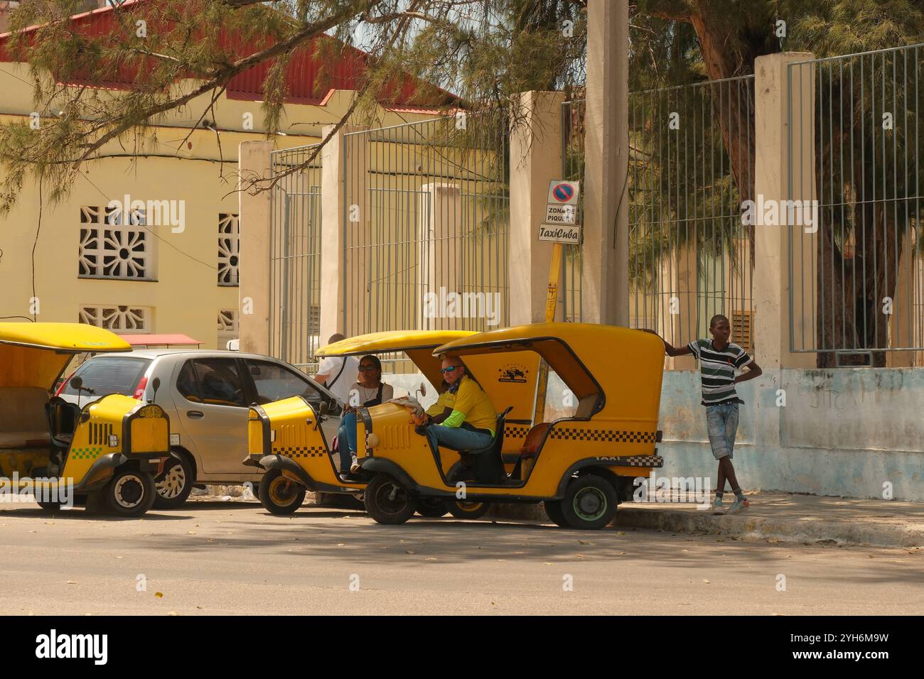 Havana, Cuba 2024 Apr17. Coco taxi drivers waiting to pick up ...