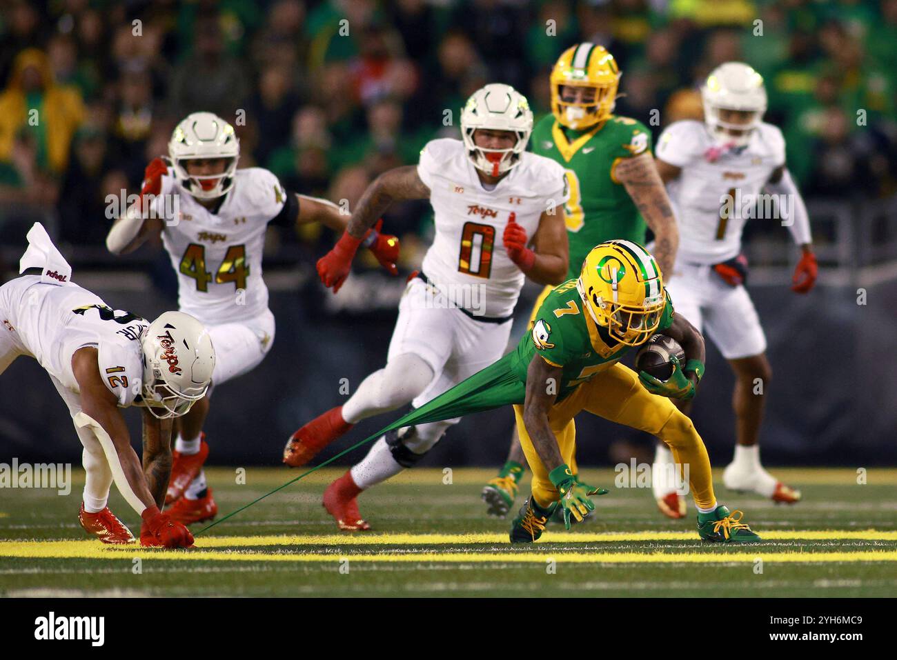 Maryland defensive back Dante Trader Jr. (12) tears the jersey of ...