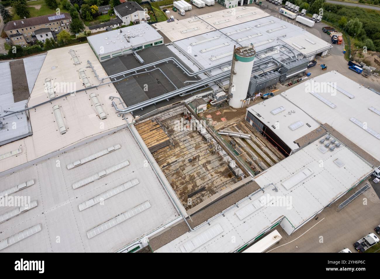 a Part of a huge factory is being renovated Stock Photo - Alamy