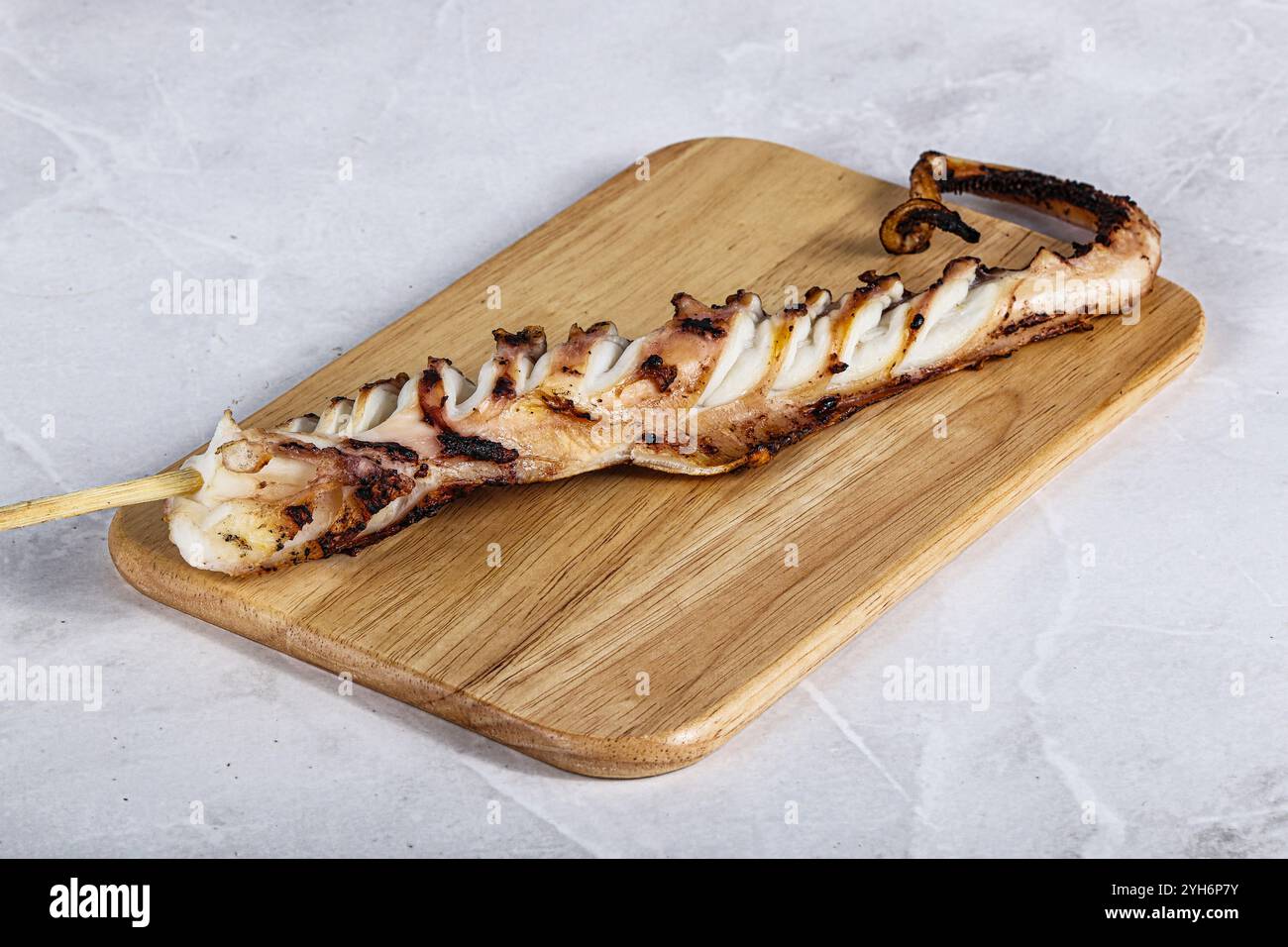 Delicous tasty Grilled octopus tentacle snack Stock Photo - Alamy