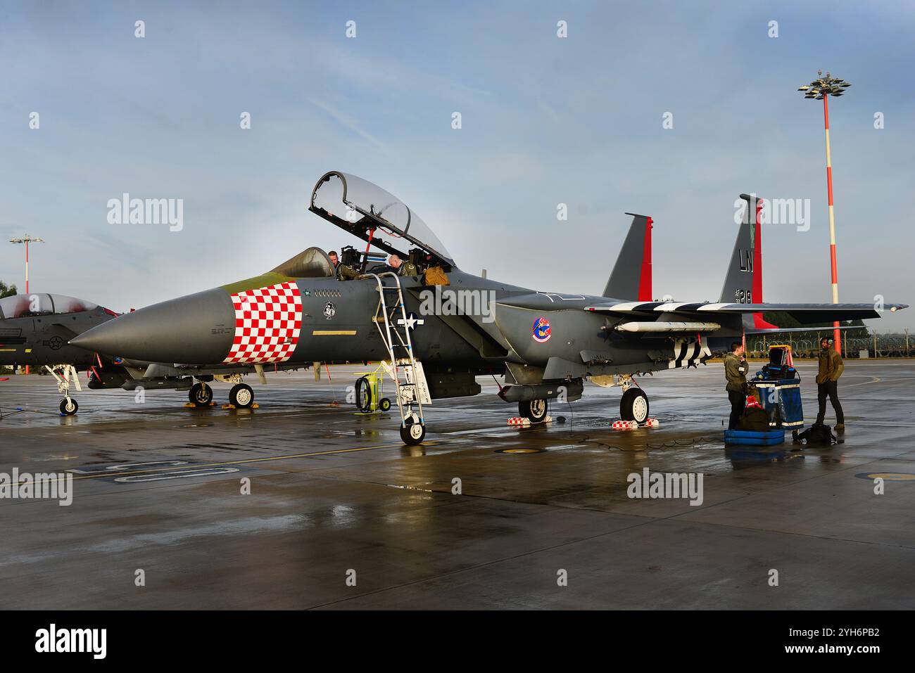 An aircrew assigned to the 492nd Fighter Squadron conducts a preflight ...