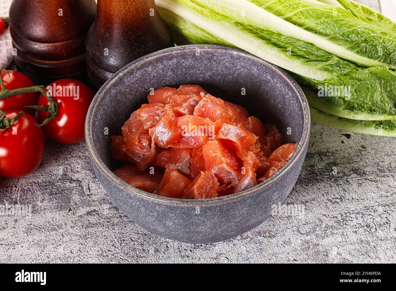 Salted tasty salmon cubes for cooking Stock Photo - Alamy