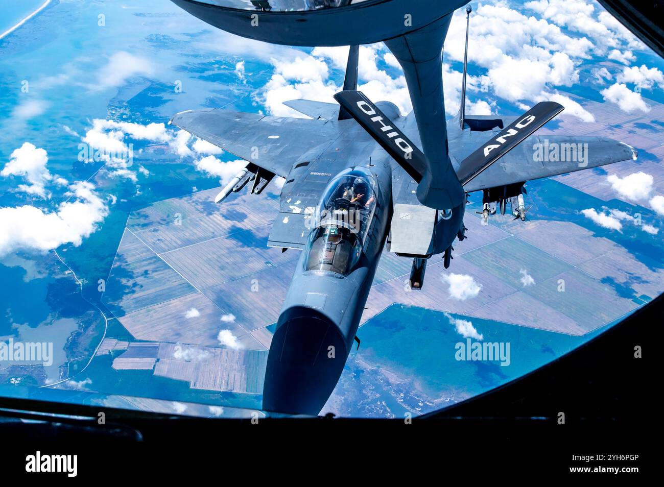 A KC-135 Stratotanker with the 121st Air Refueling Wing refuels an F-15E Strike Eagle, assigned ...