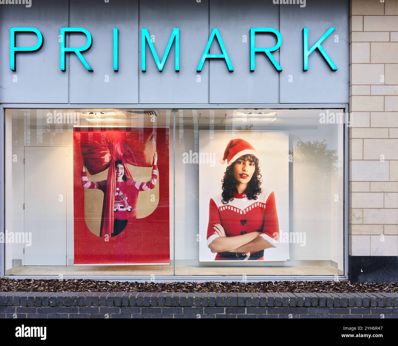 Christmas clothes in the window display at Primark clothing shop in the ...
