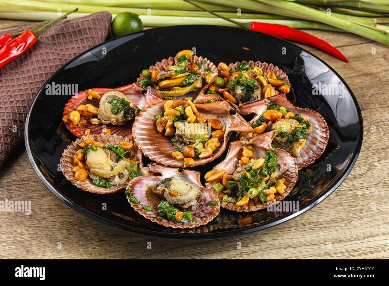 Baked scallops with scalion oil and green onion Stock Photo - Alamy