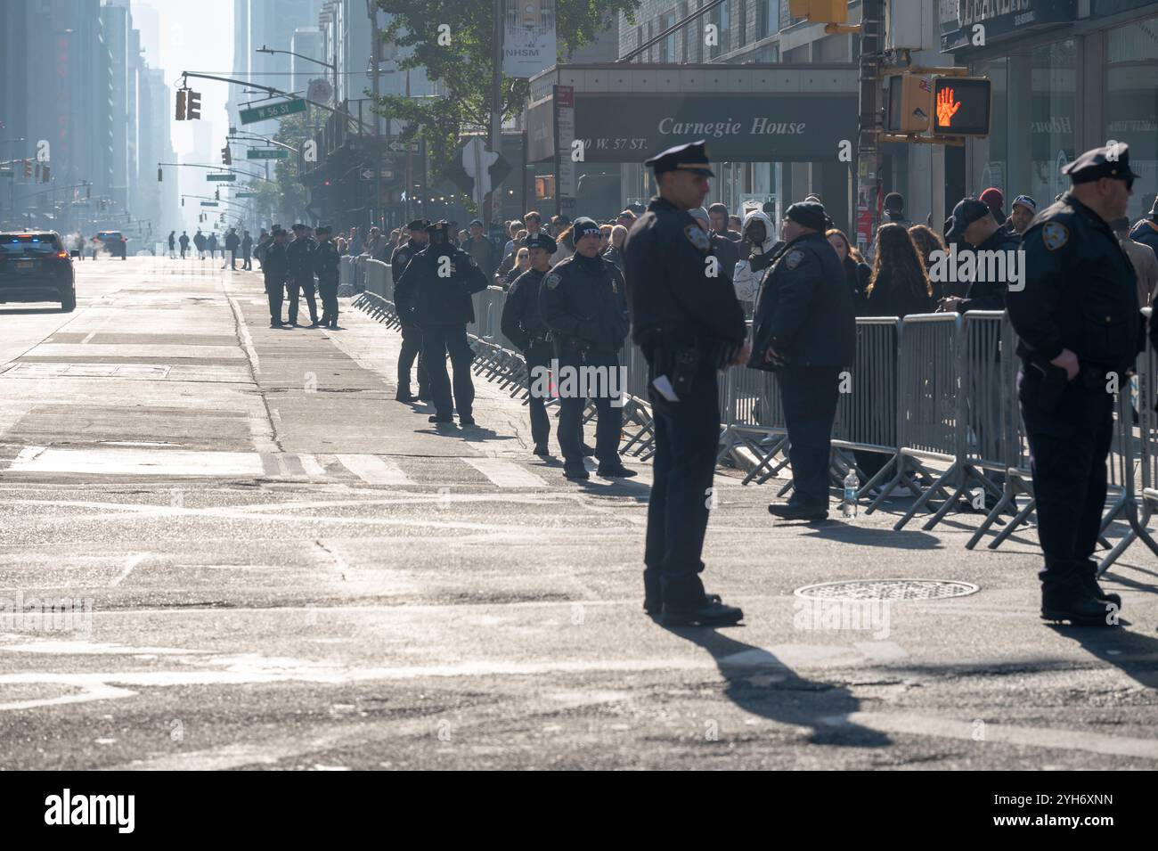 New York Police Department (NYPD) officers monitor the crowd during ...
