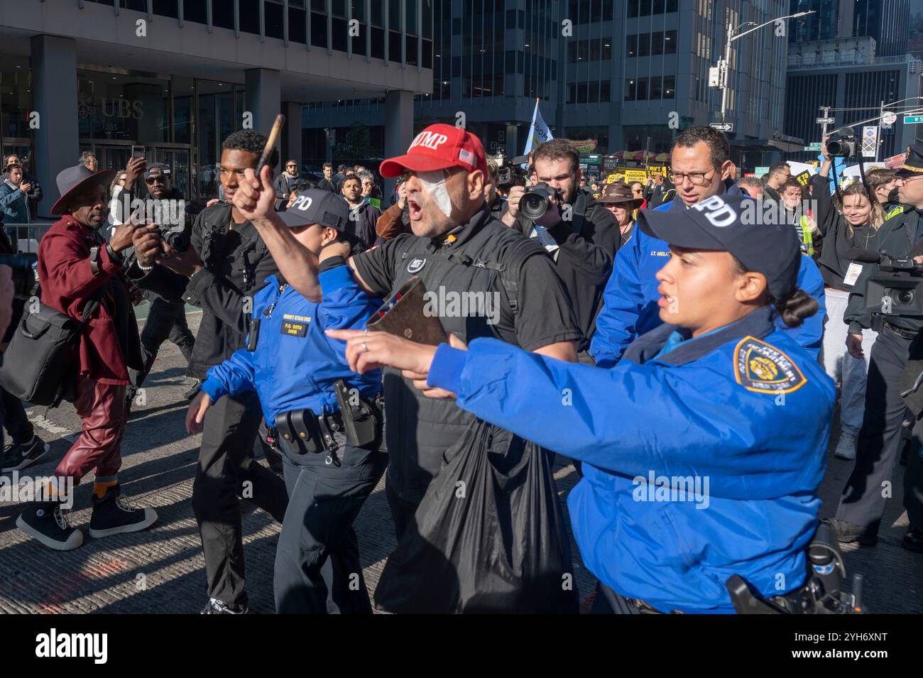 New York Police Department (NYPD) officers remove a President Elect ...