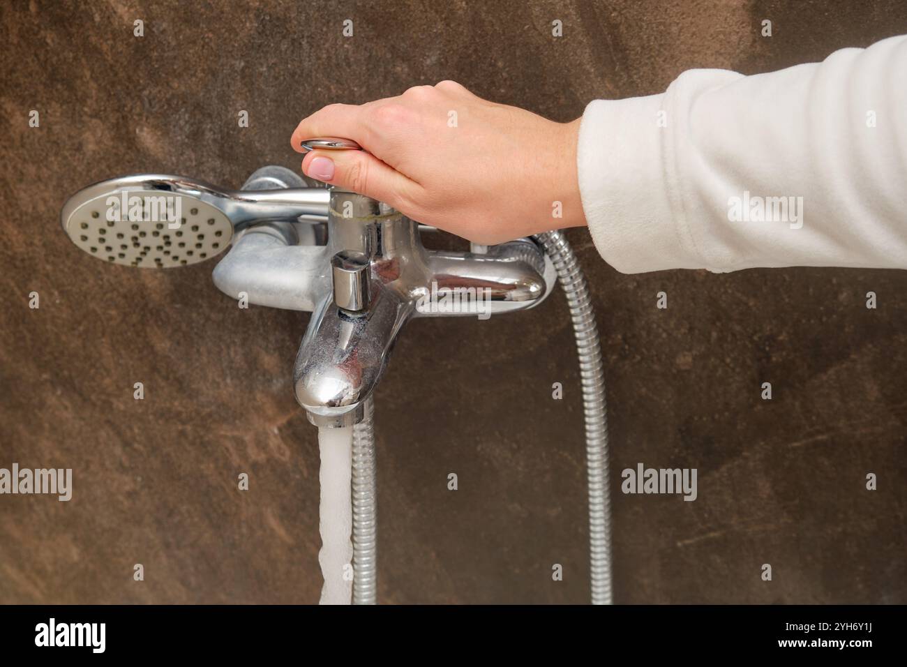 Woman turning bathroom faucet washing hi-res stock photography and ...