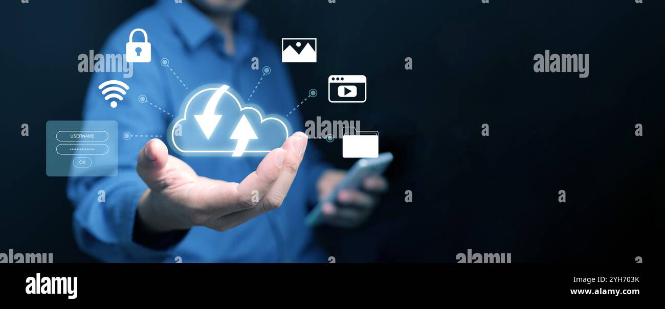 Cloud computing concept. A man with cloud computing service enables him ...