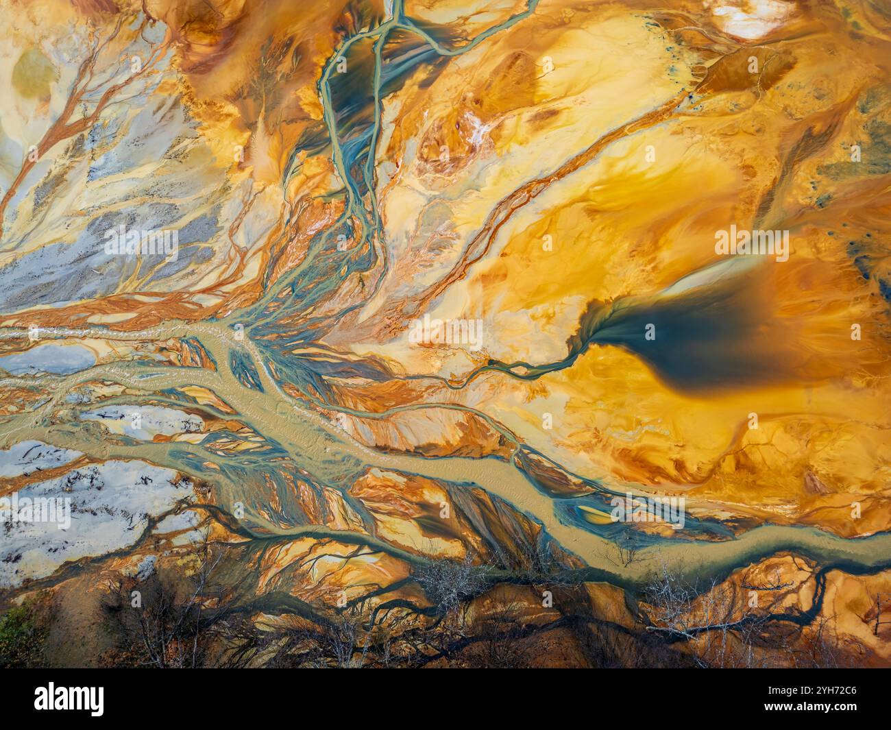 Abstract patterns formed from the toxic waste of the copper and gold ...