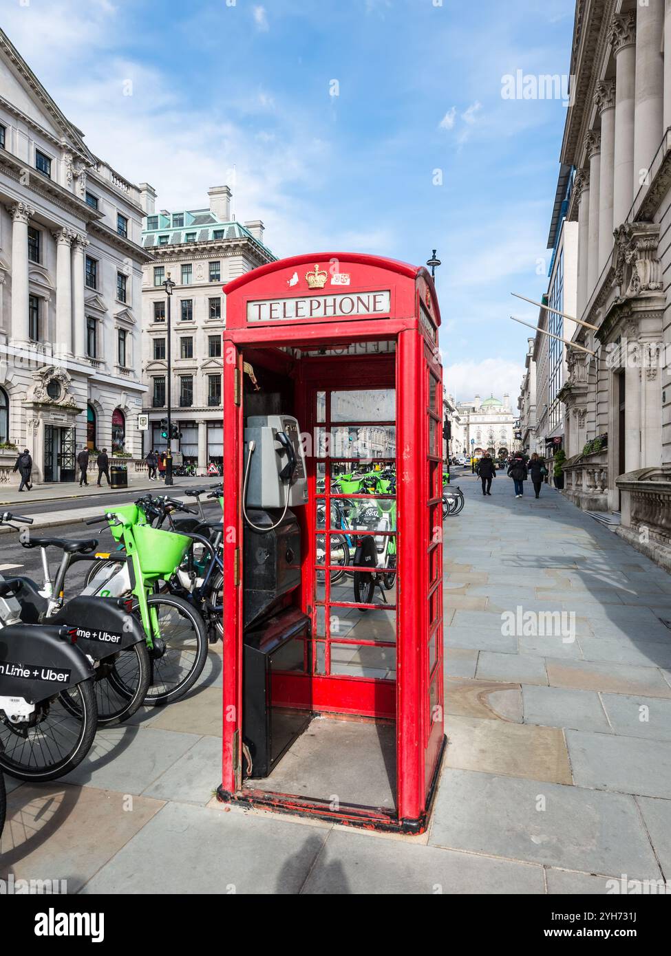 London, UK - March 27, 2024: The red telephone box, a public telephone ...