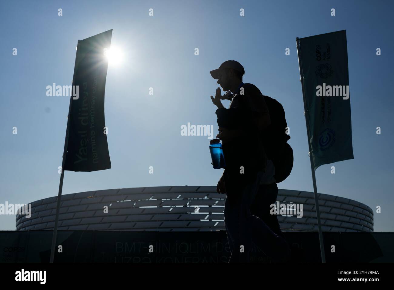A person walks outside the Baku Olympic Stadium, the venue for the ...