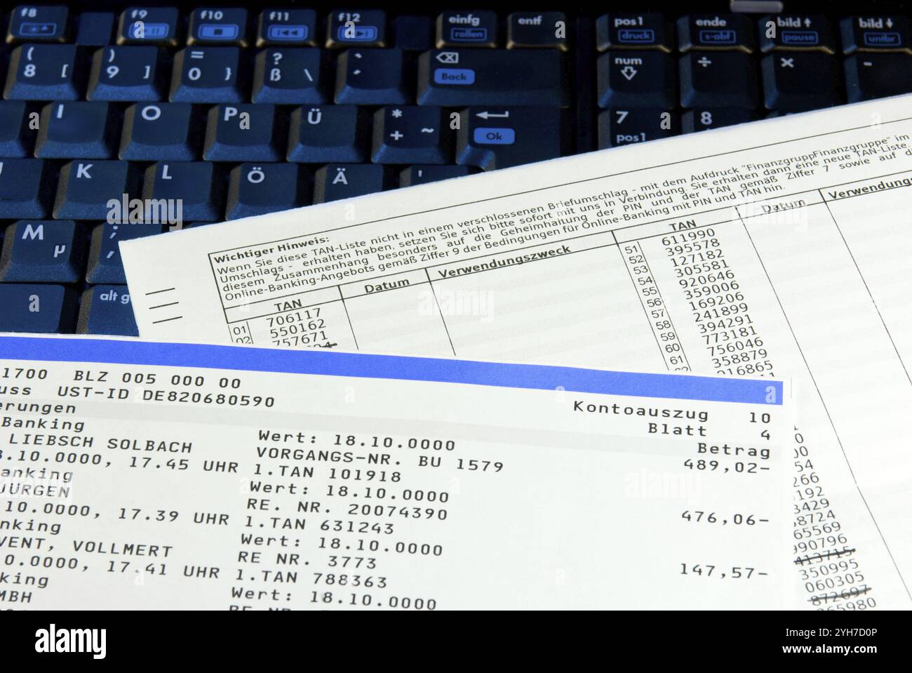 TAN list and account statement lying on a PC keyboard, Federal Republic ...