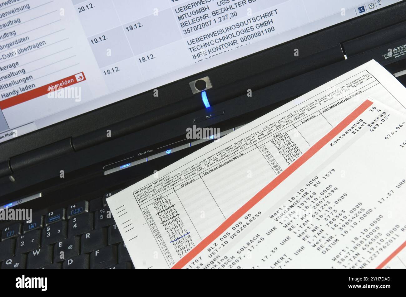 TAN list and account statement lying on a PC keyboard, Federal Republic ...