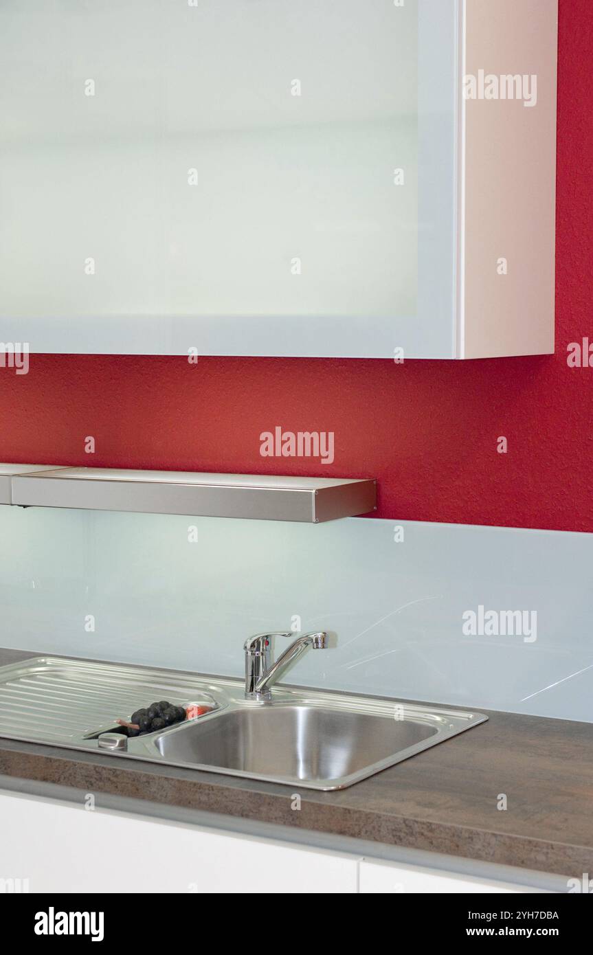 Modern kitchen unit with wall unit, base unit, extractor bonnet, sink ...