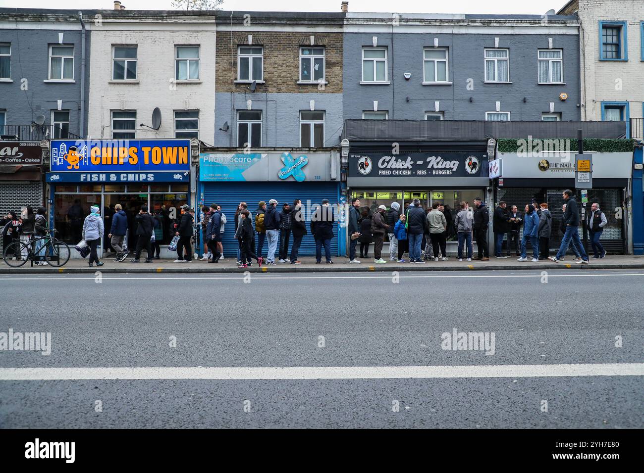 Fans eat at local food places outside Tottenham Hotspur Stadium prior ...