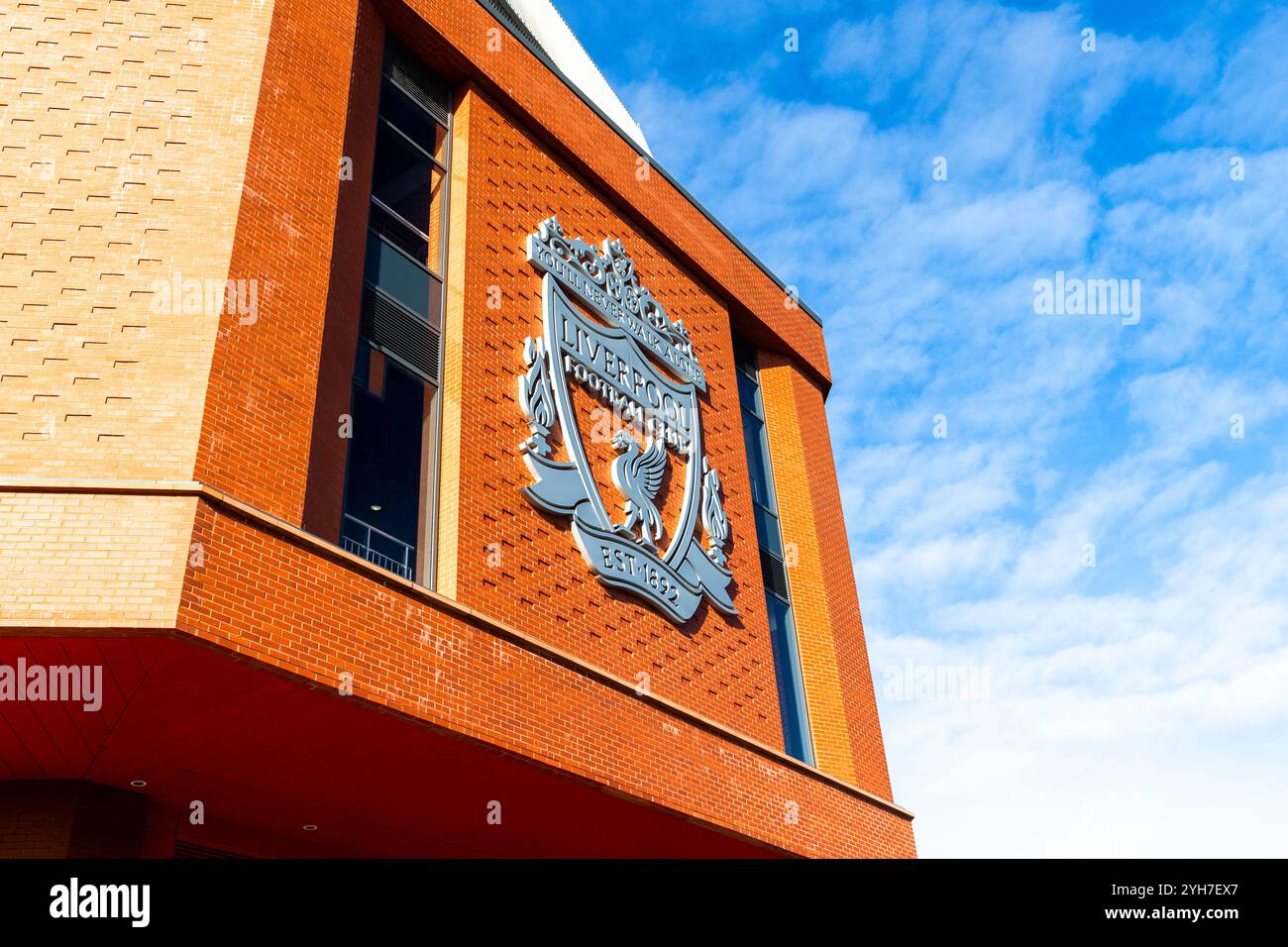Liverpool FC`s crest seen in silver high up on Anfield Stadium under ...
