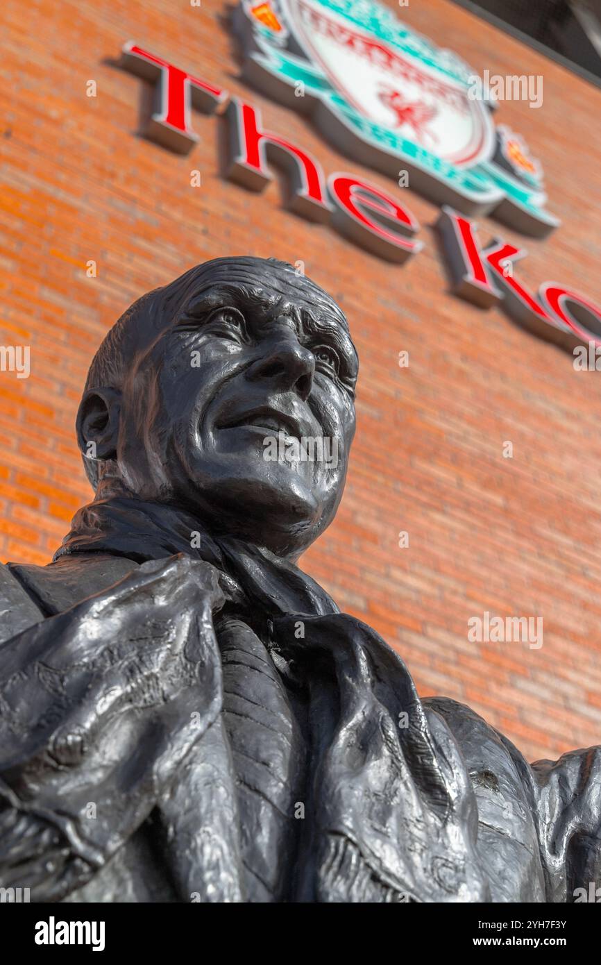 Looking up towards the statue of Bill Shankly with "The Kop" and ...