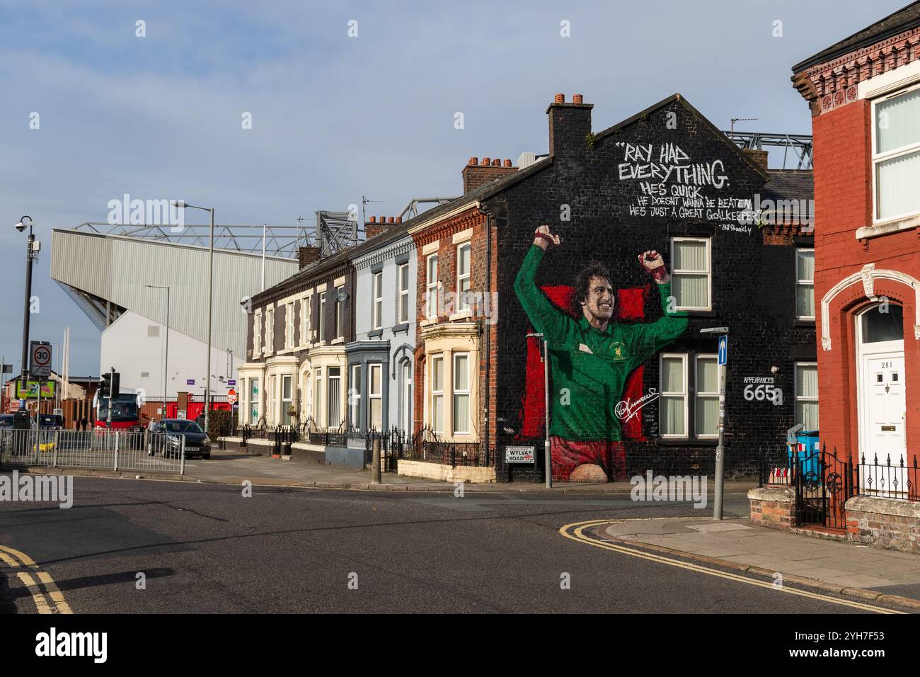 View of Anfield Stadium with the mural of Ray Clements on the end of a ...