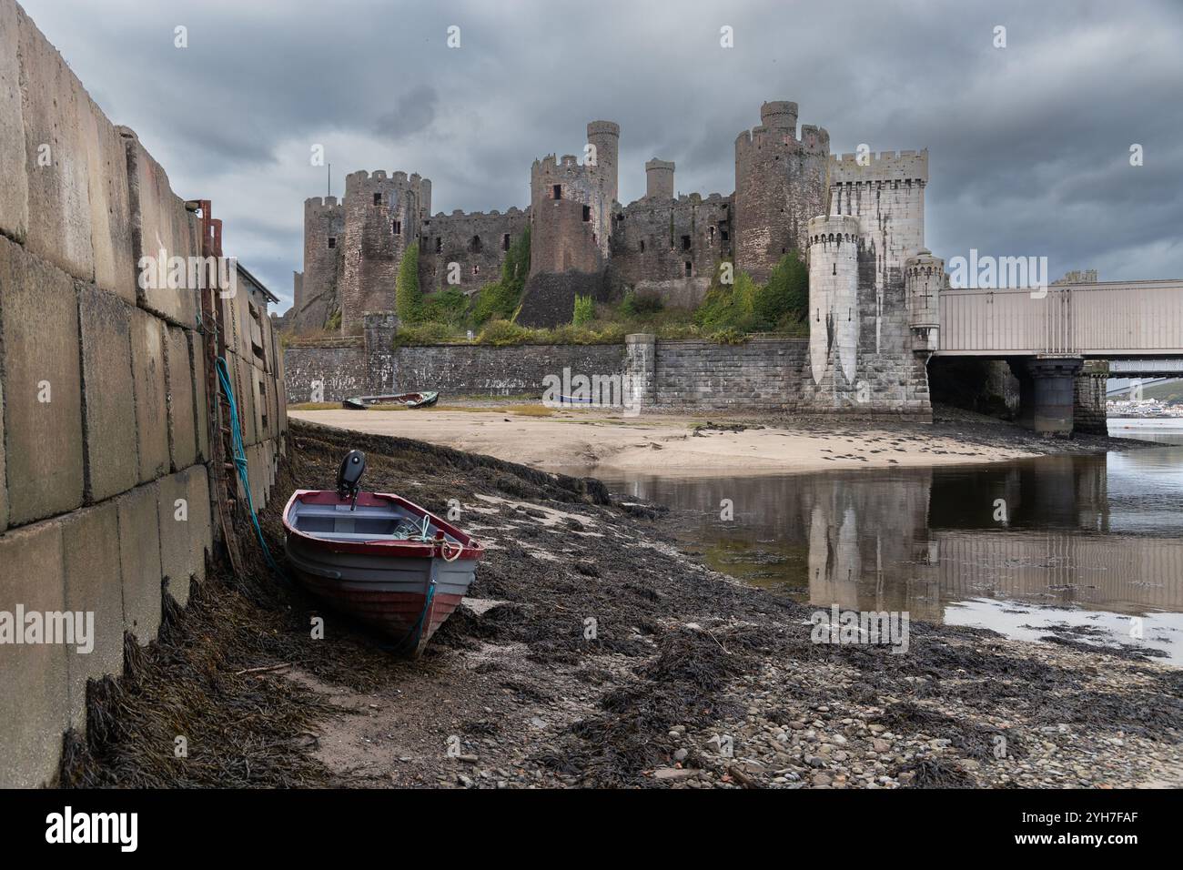 leading lines towards Conwy Castle with rowing boat awaiting high tide ...