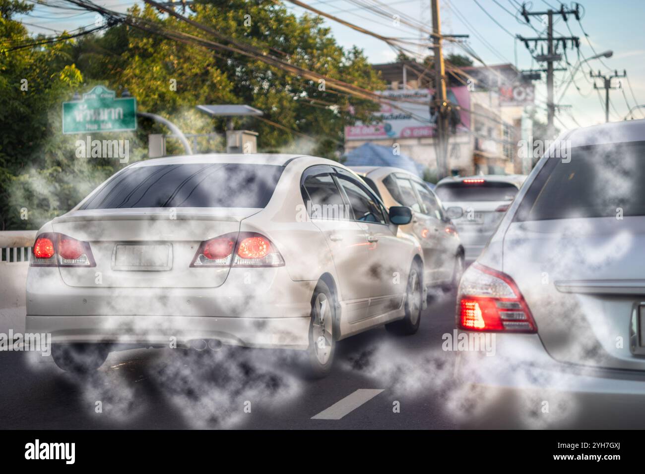 Air pollution from car exhaust smoke traffic in the city. Reducing ...