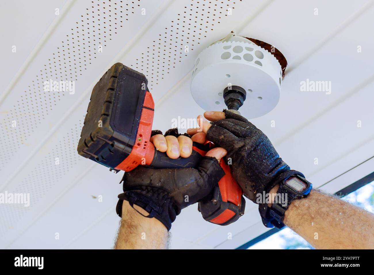 Preparing ceiling for installation of a new light fixture with using ...