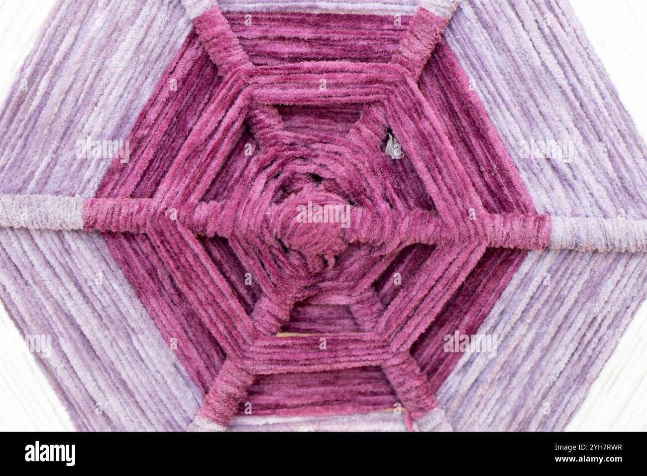Closed up of violet color hexagon shape of weave textured background ...