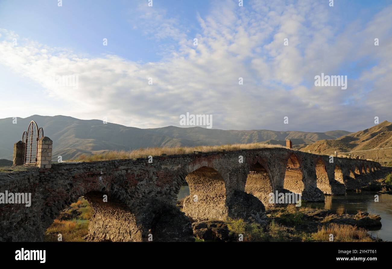 Historic Khudafarin Bridge over the Aras River on the border of ...